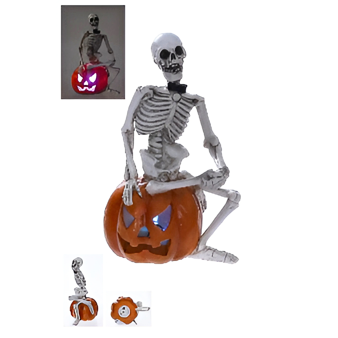 5" Resin Skeleton Sitting on Lighted Pumpkin | THE OUTER BANKS ...